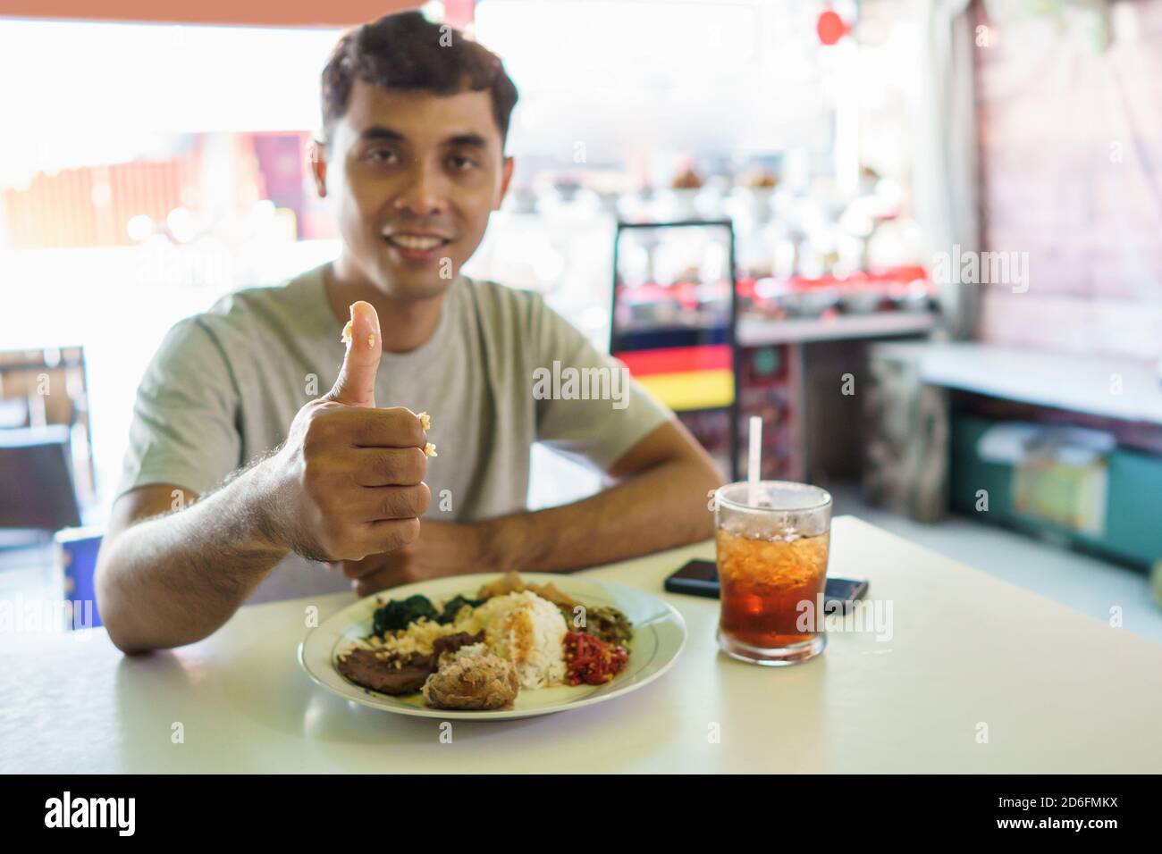 Man eating curry hi-res stock photography and images - Alamy
