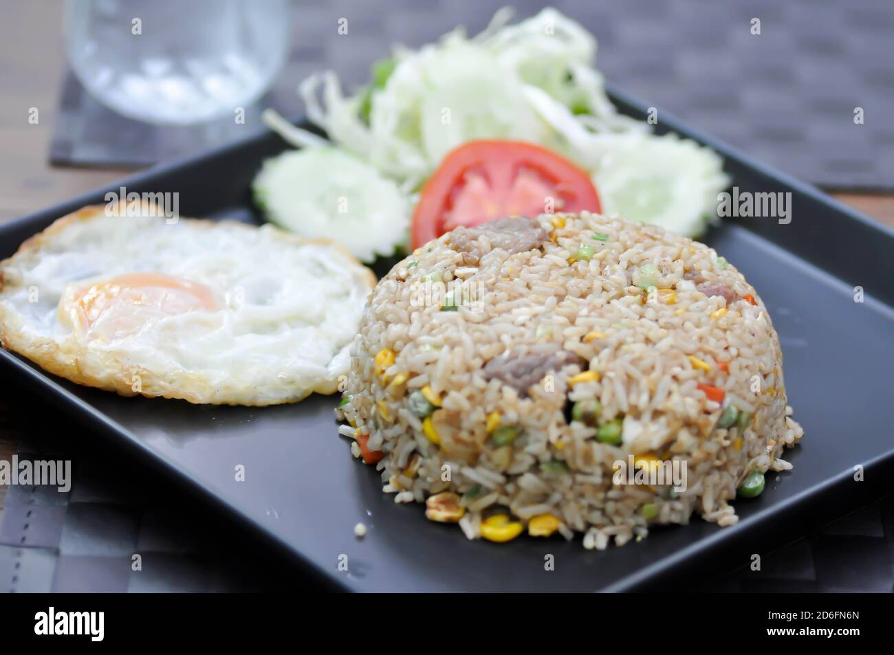 stir fried rice or fried rice with egg and vegetable Stock Photo - Alamy