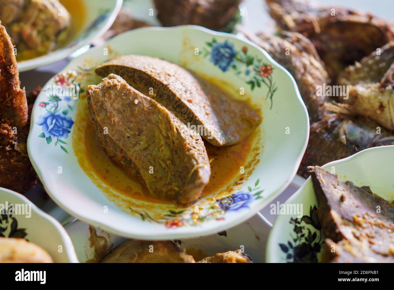a portrait of spleen food on a plate in a traditional food dish Stock ...