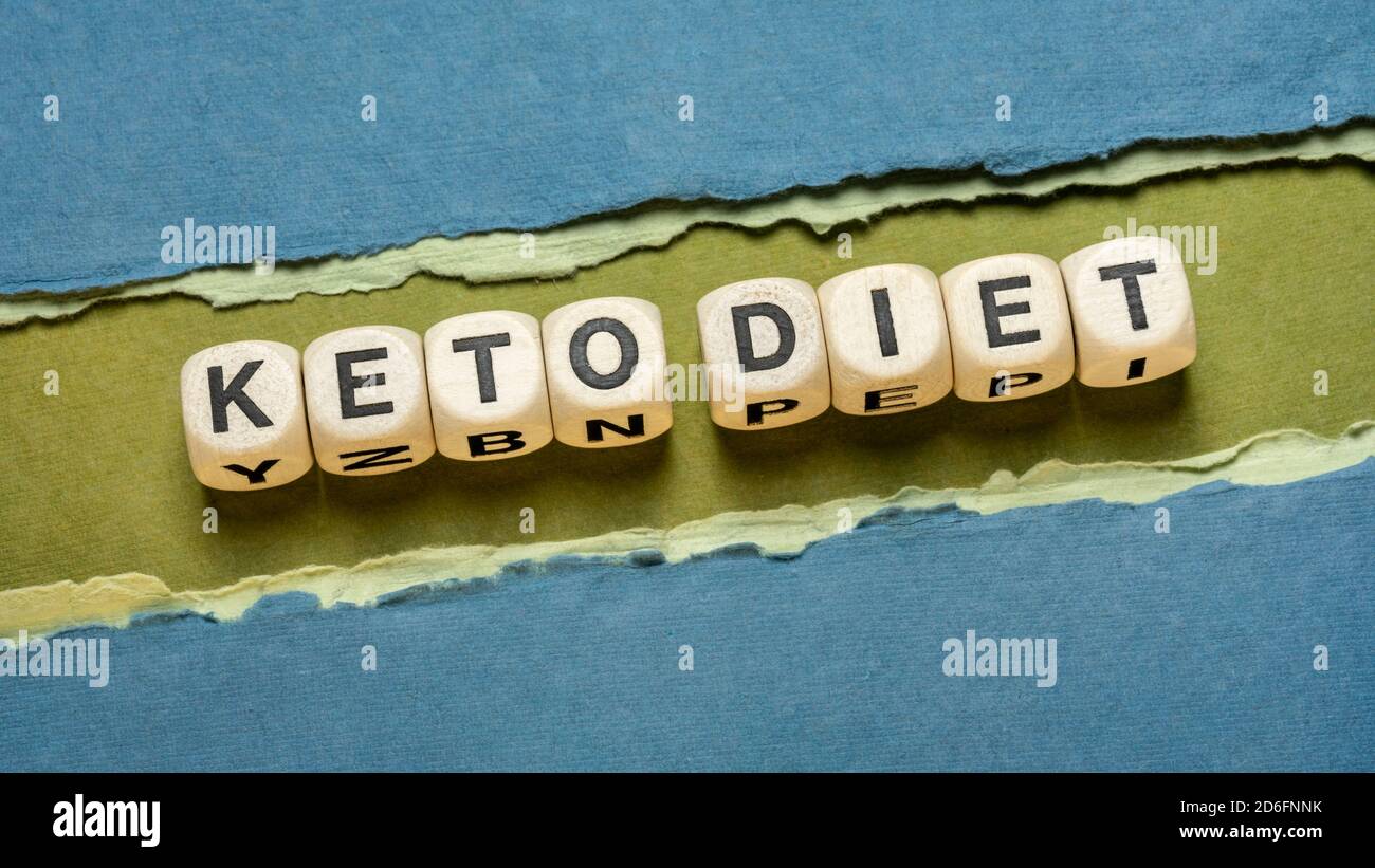 keto diet word abstract in wooden letter cubes against paper abstract ...