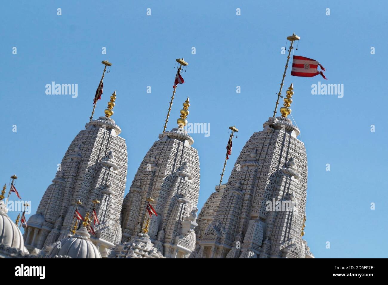 TORONTO, CANADA - 06 26 2016: Domes and spires with flags of the BAPS ...
