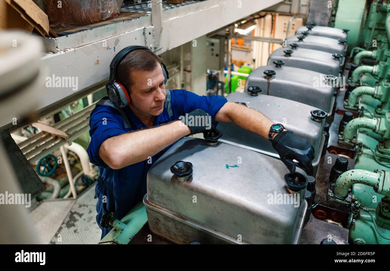 Marine engineer officer controlling vessel enginesand propulsion in ...