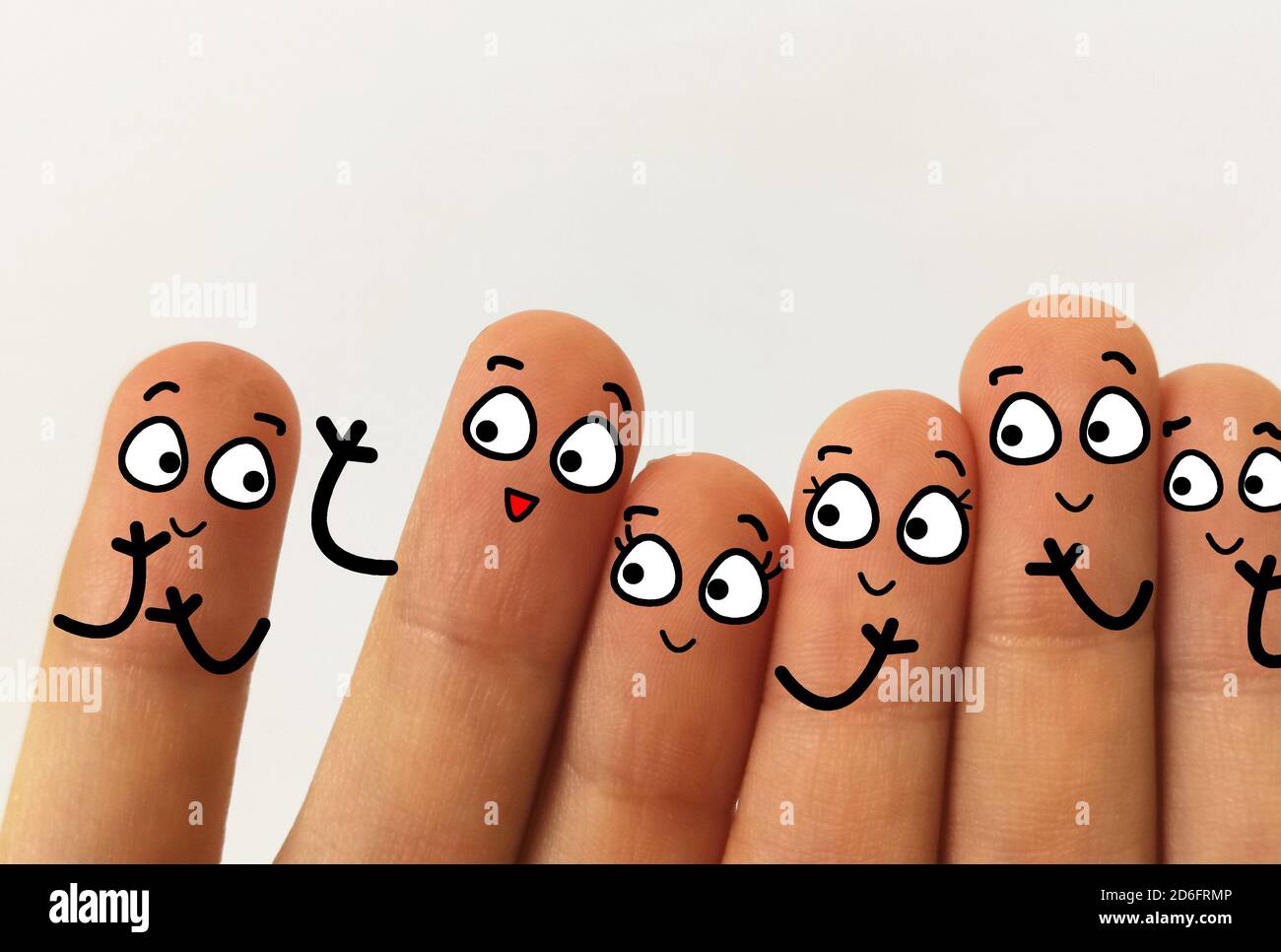 Six fingers are decorated as a group of people. Five person are ...