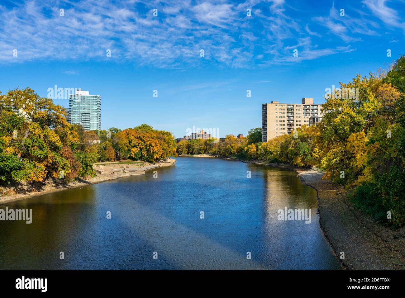 The Assiniboine River with fall foliage color in Winnipeg, Manitoba ...
