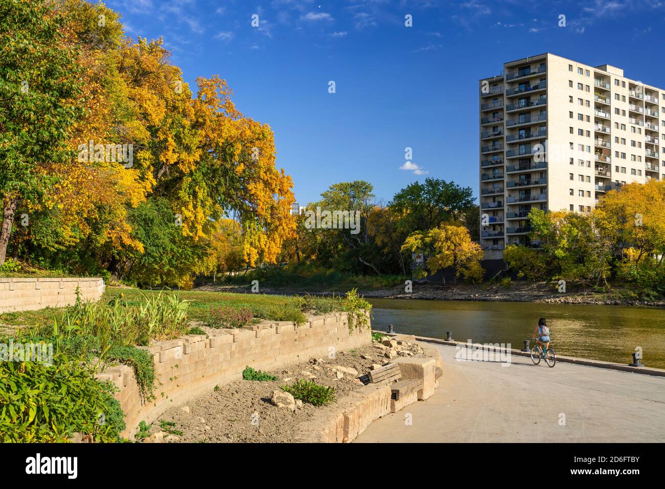 The Assiniboine River with fall foliage color in Winnipeg, Manitoba ...