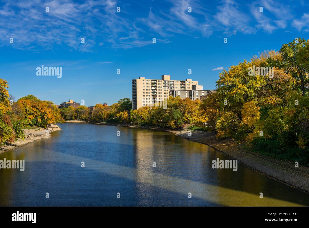 The Assiniboine River with fall foliage color in Winnipeg, Manitoba ...