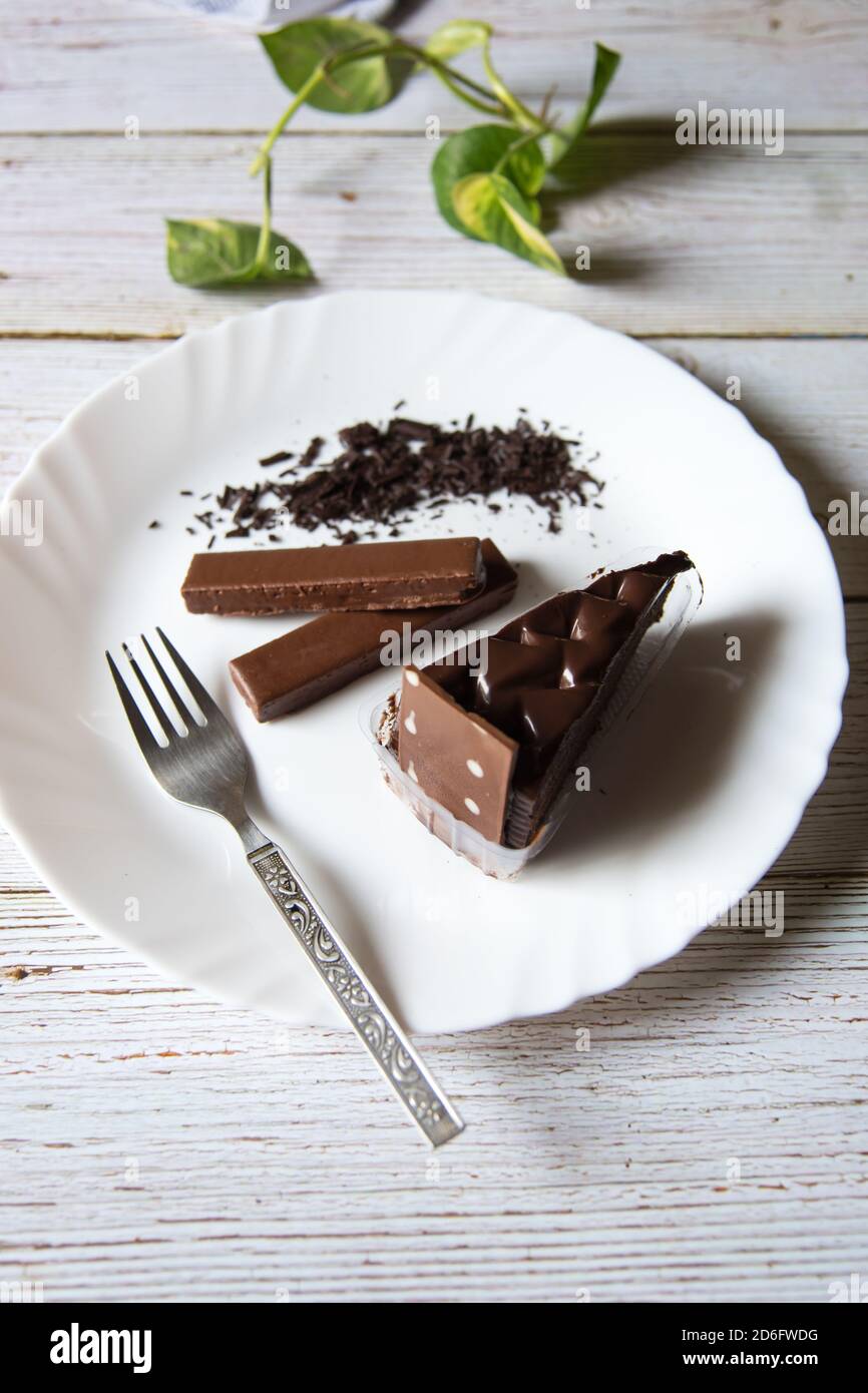 Vertical top view of Chocolate pastry and chocolate condiments Stock ...