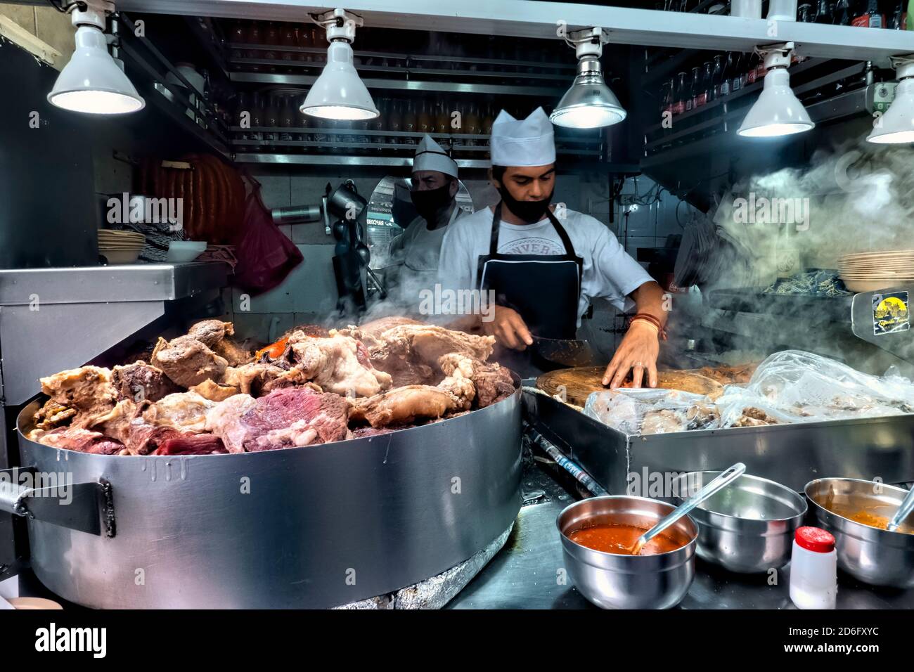 Chef preparing suadero tacos at Los Cocuyos, Mexico City, Mexico Stock ...