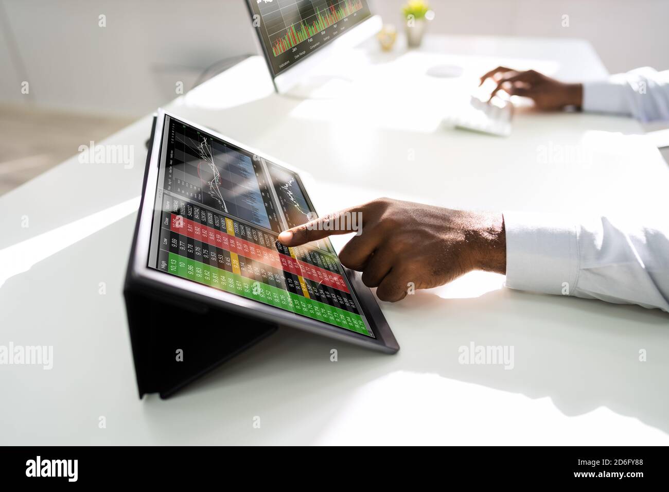 Stock Market Exchange Trading On Tablet Online Stock Photo - Alamy