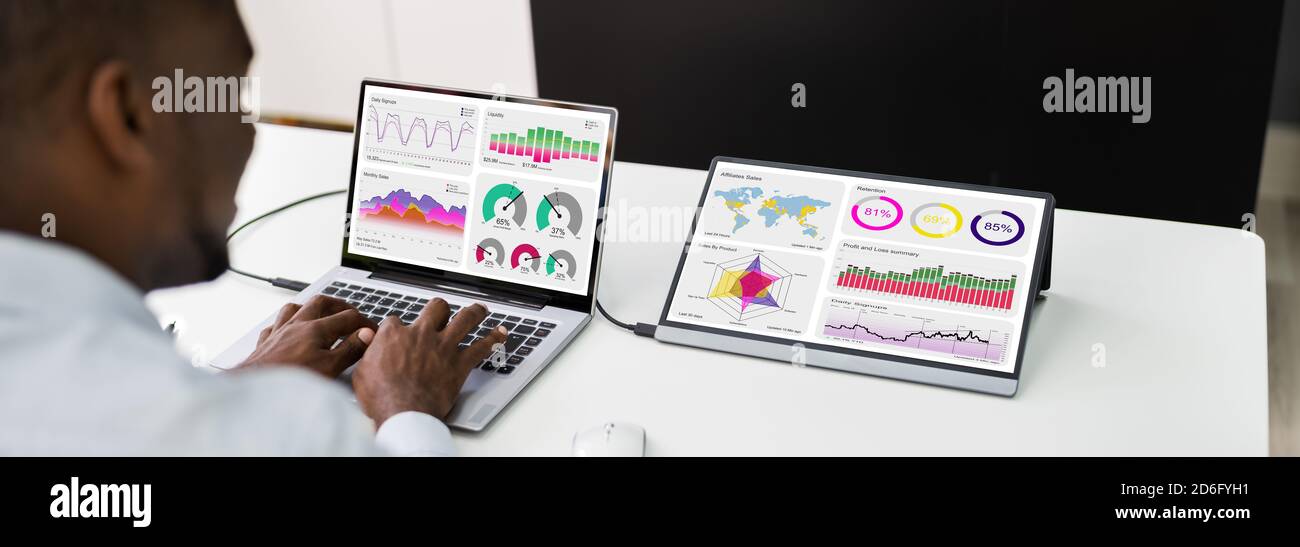 African American Business Man Analyst Using Data Analytics Stock Photo ...