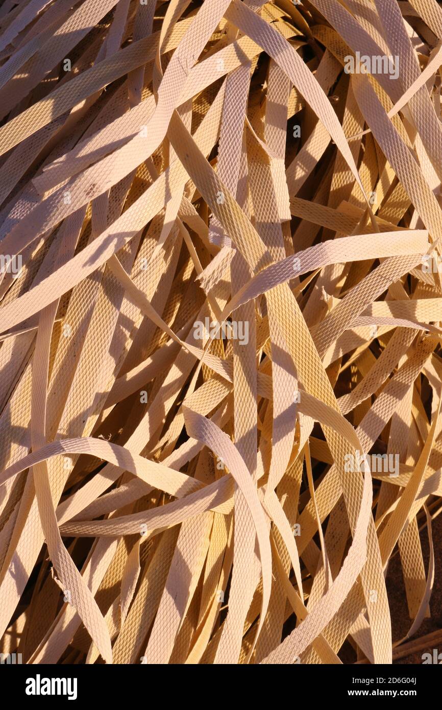 A pile of tangled yellow packing straps Stock Photo - Alamy