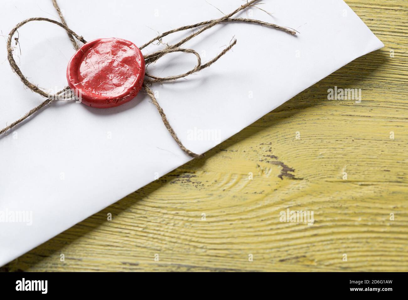 Letter with seal on table Stock Photo - Alamy