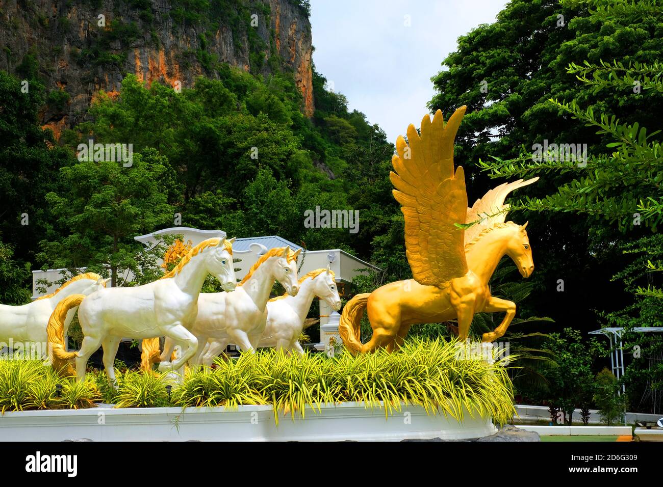 Side view of horse statues on mountain backdrop Stock Photo - Alamy