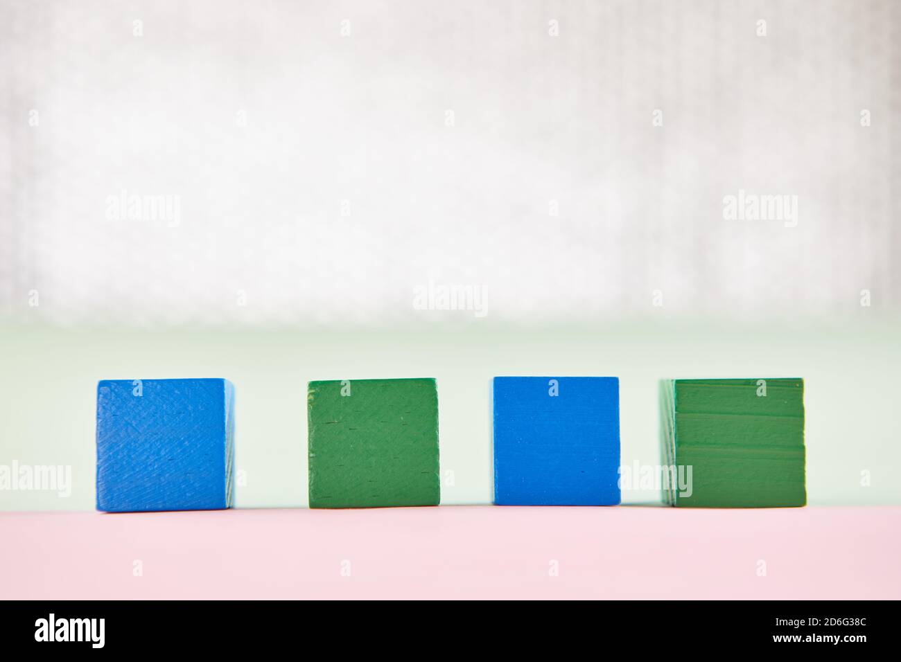 Mock up concept of the year. Wooden blocks with glittering background ...