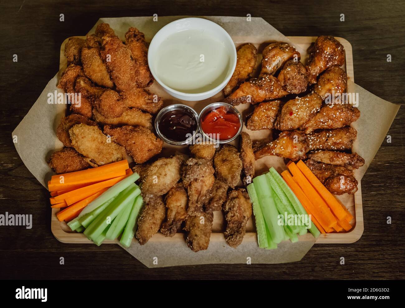 Fried chicken legs and wings in a restaurant. Chicken menu Stock Photo ...