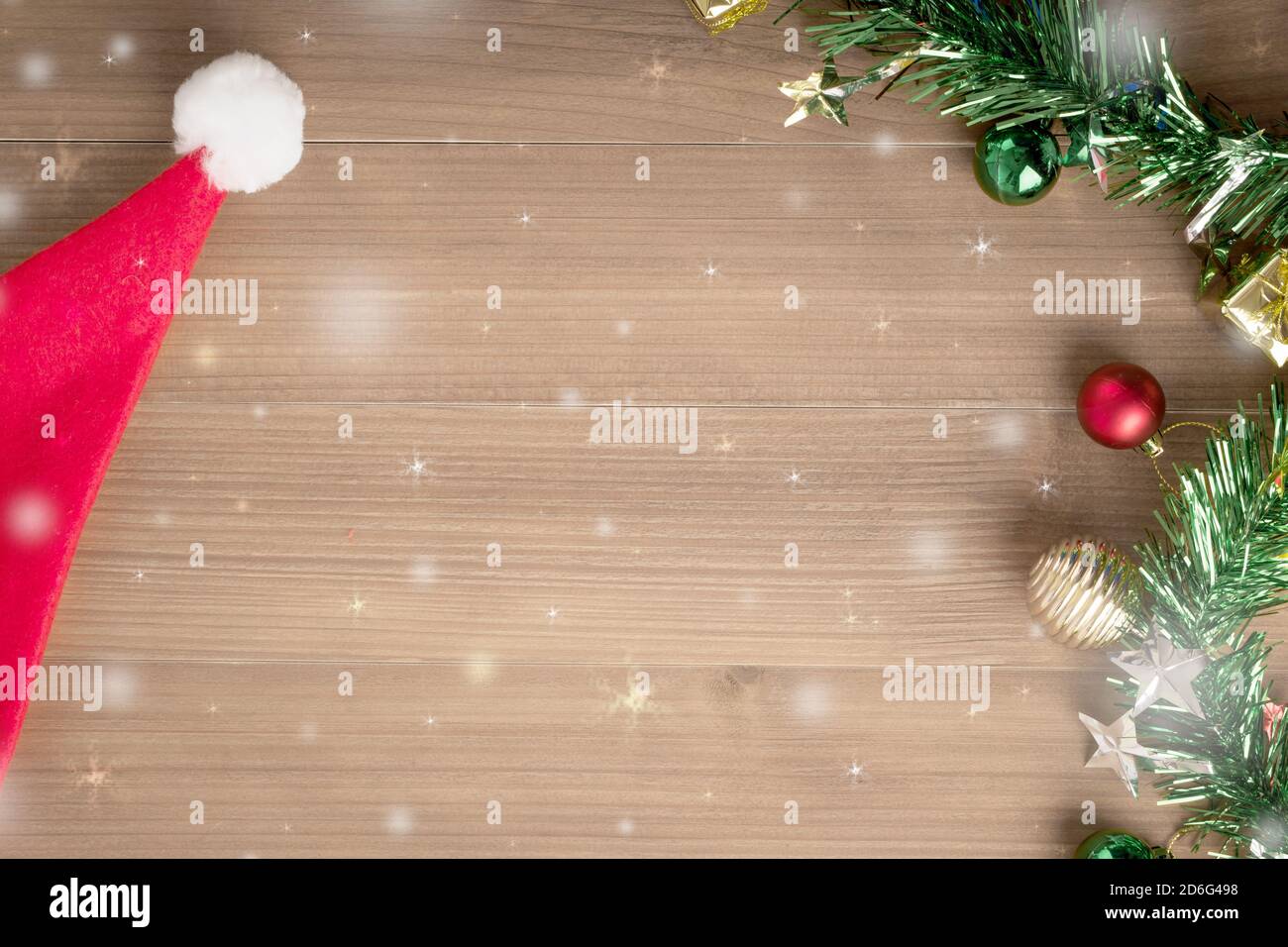 Christmas holiday background with Santa hat and decorations Stock Photo ...