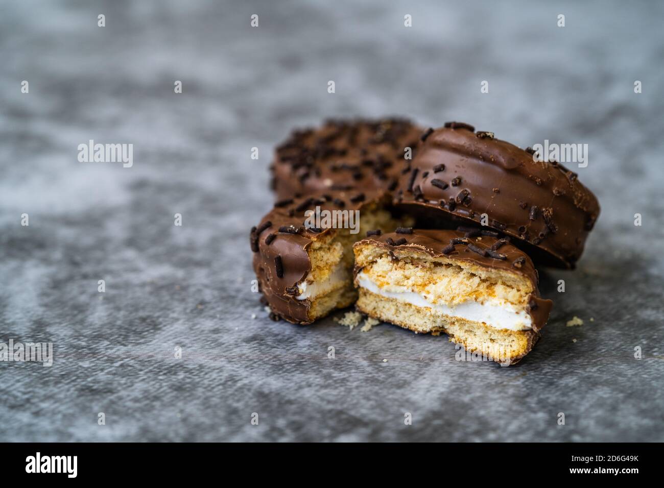 Traditional Alfajores (Alfajor) with dulce de leche covered with ...