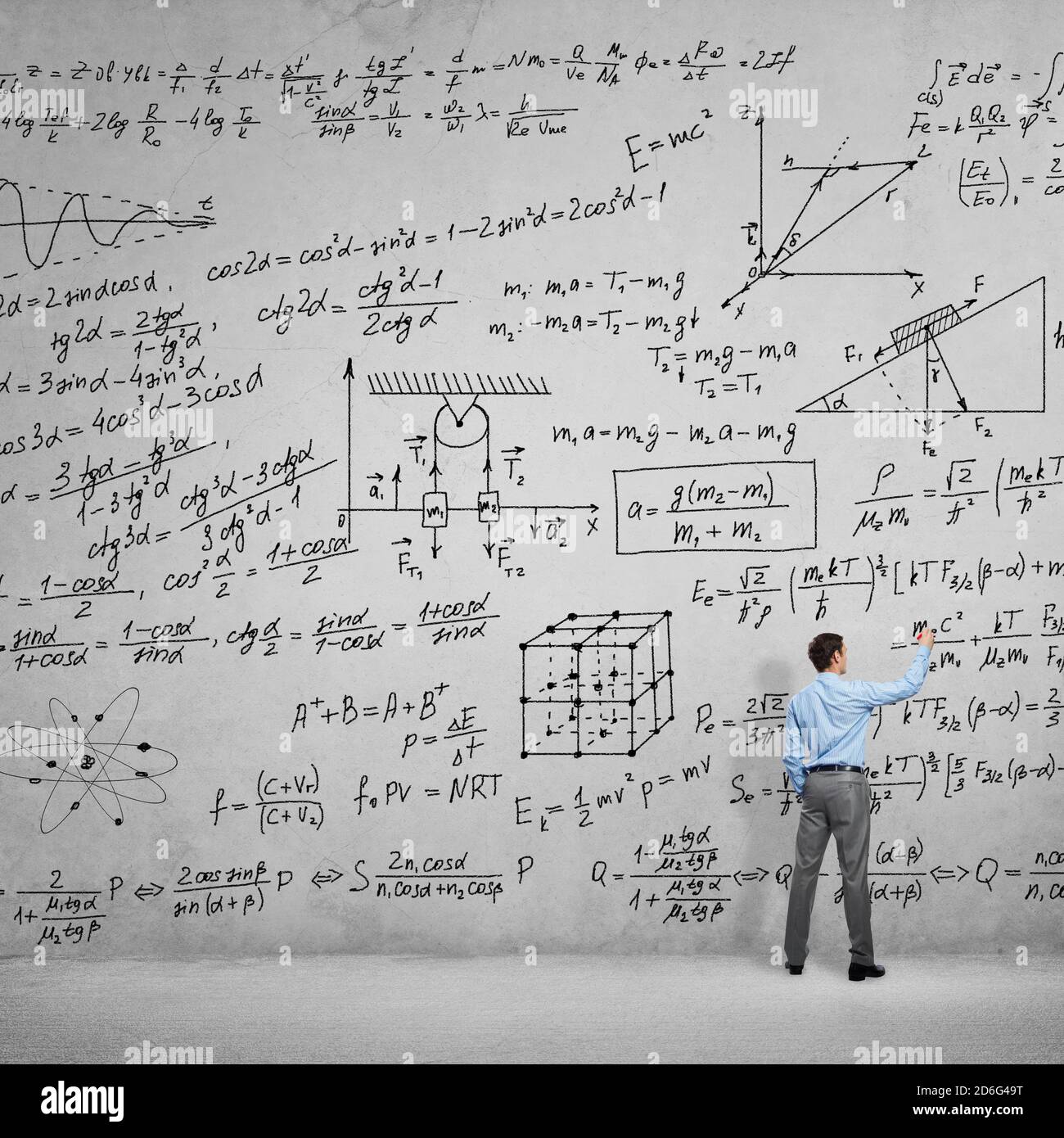 Man draw science formulas Stock Photo - Alamy