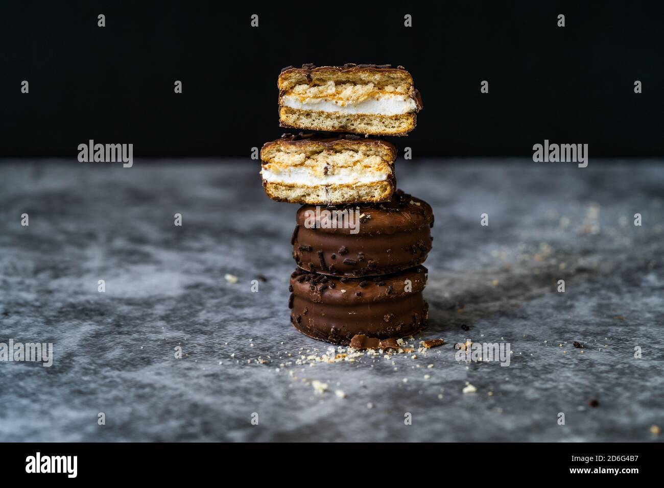 Traditional Alfajores (Alfajor) with dulce de leche covered with ...