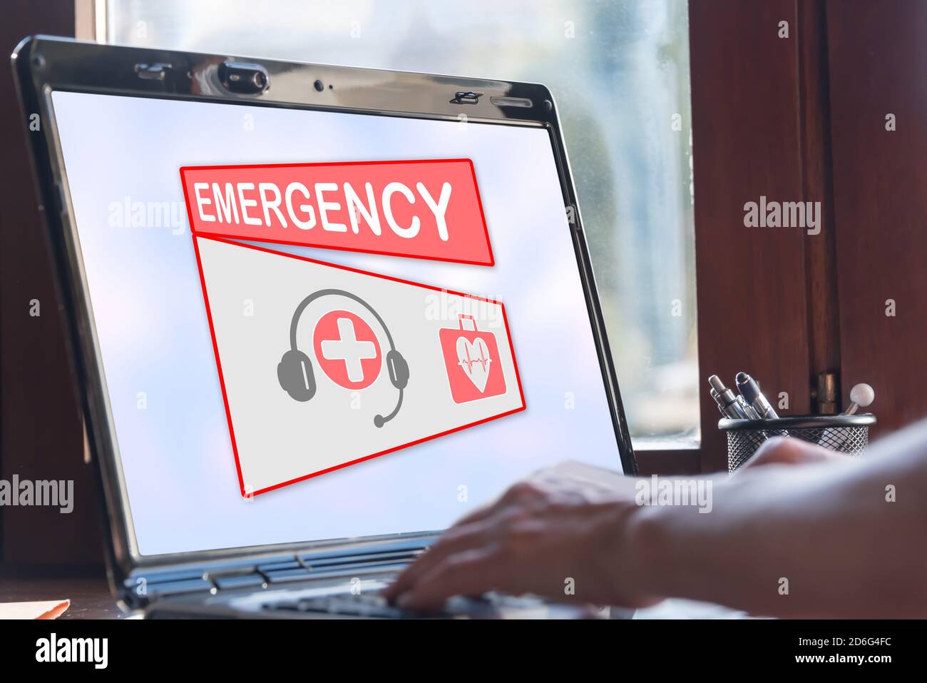 Laptop screen displaying an emergency concept Stock Photo - Alamy