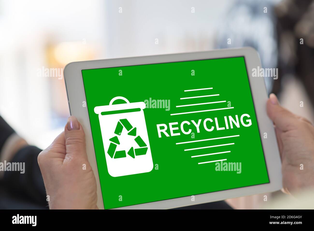 Tablet screen displaying a recycling concept Stock Photo - Alamy