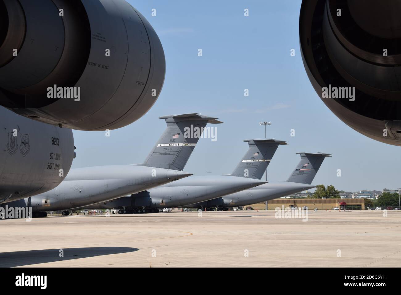 C-5M Super Galaxy cargo aircraft assigned to Travis Air Force Base, California, sit among C-5Ms ...
