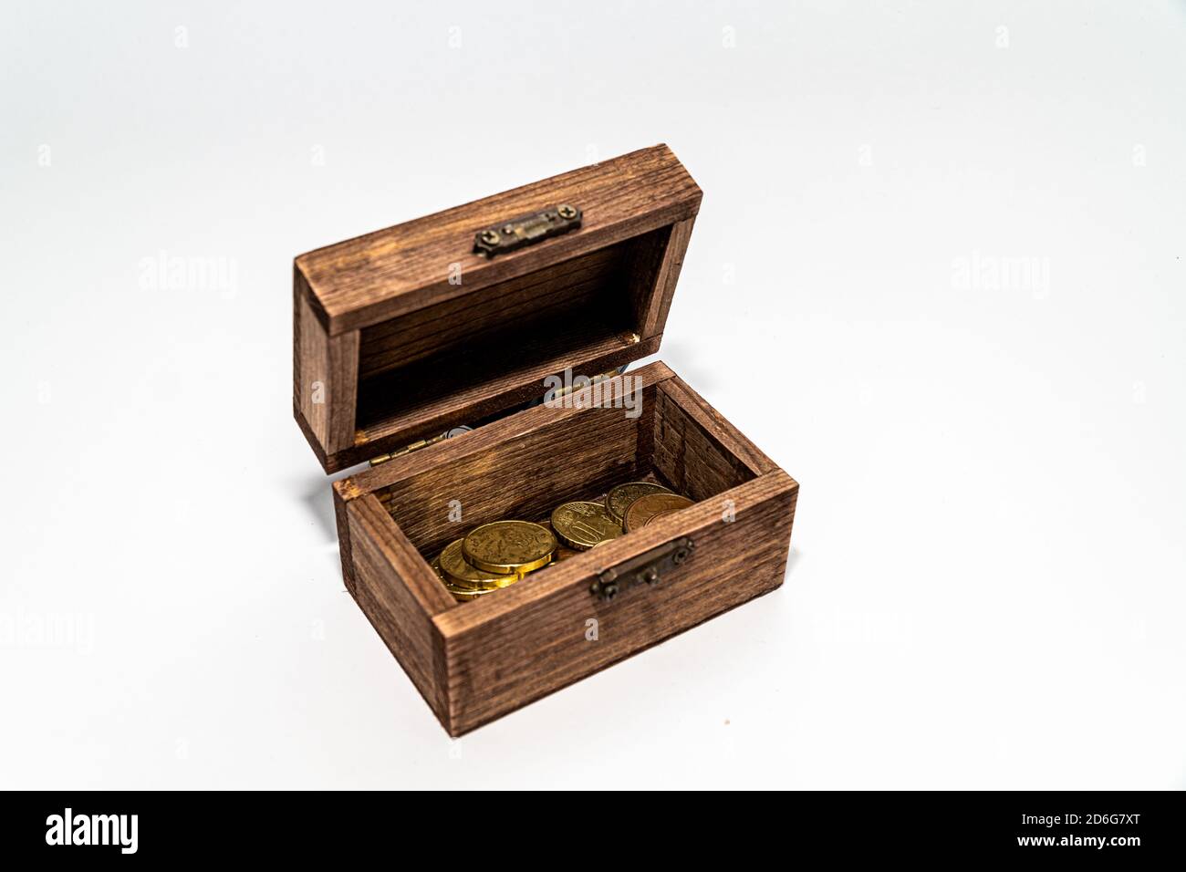 Open wooden box with coins in it isolated on a white background Stock ...