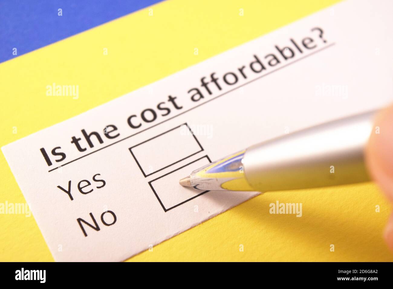 Is the cost affordable? Yes or no Stock Photo - Alamy