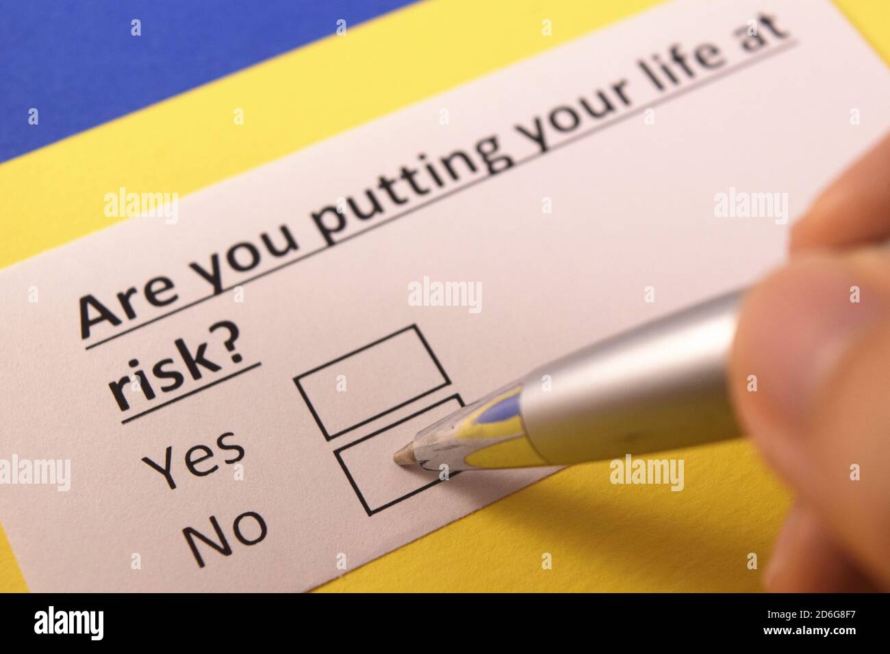 Are you putting your life at risk? Yes or no Stock Photo - Alamy