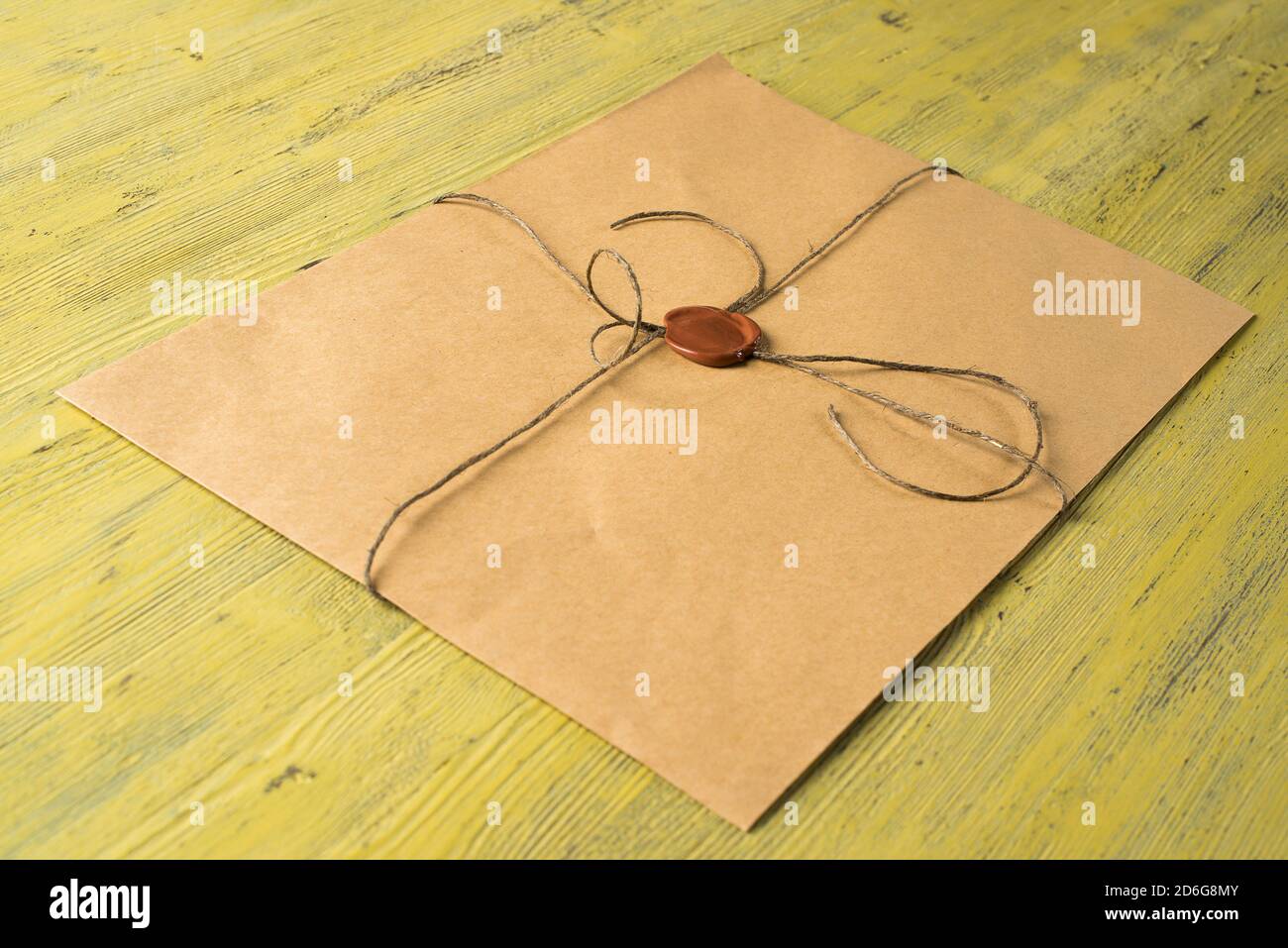 Letter with seal on table Stock Photo - Alamy