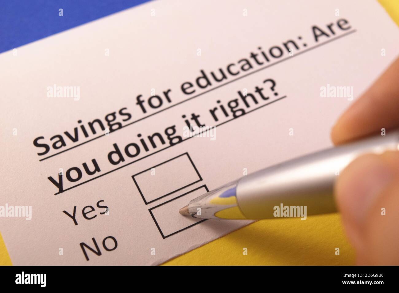 Saving for education: Are you doing it right? Yes or no Stock Photo - Alamy