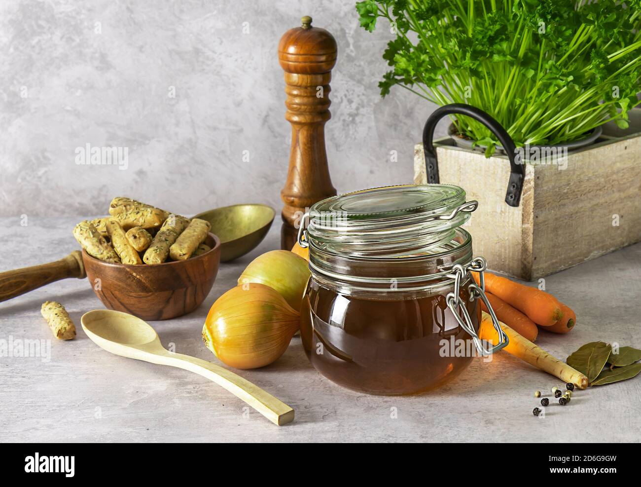 Homemade beef bone broth in a glass jar Stock Photo - Alamy