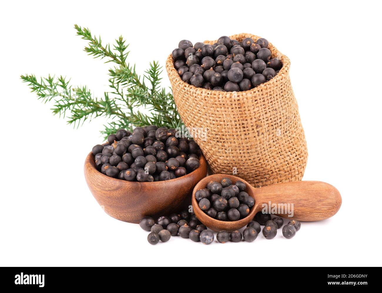 Dry juniper berries with in small burlap sack, isolated on white ...