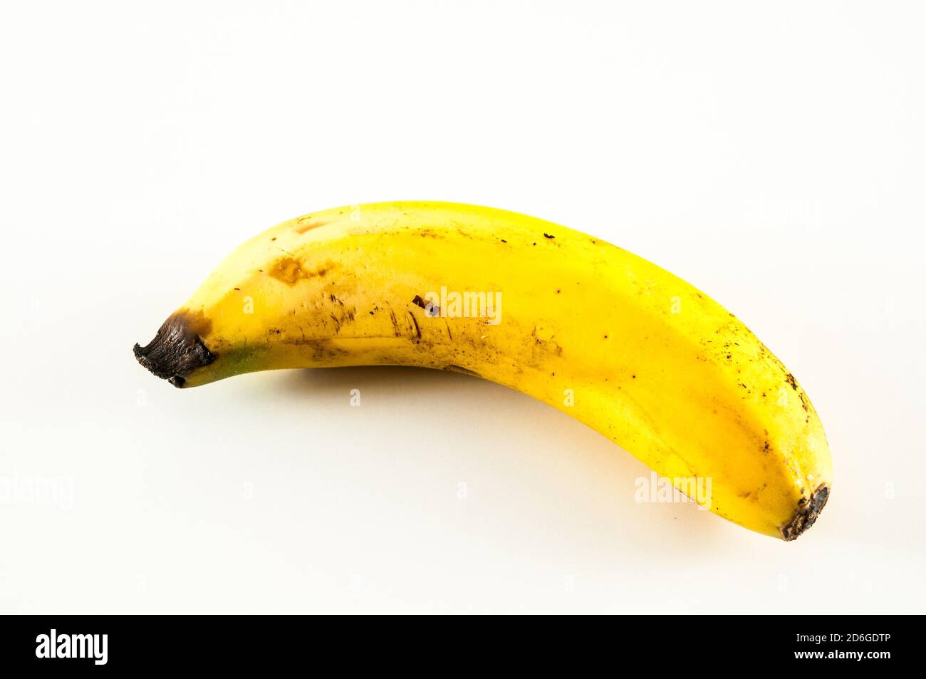 One banana on white background Stock Photo - Alamy