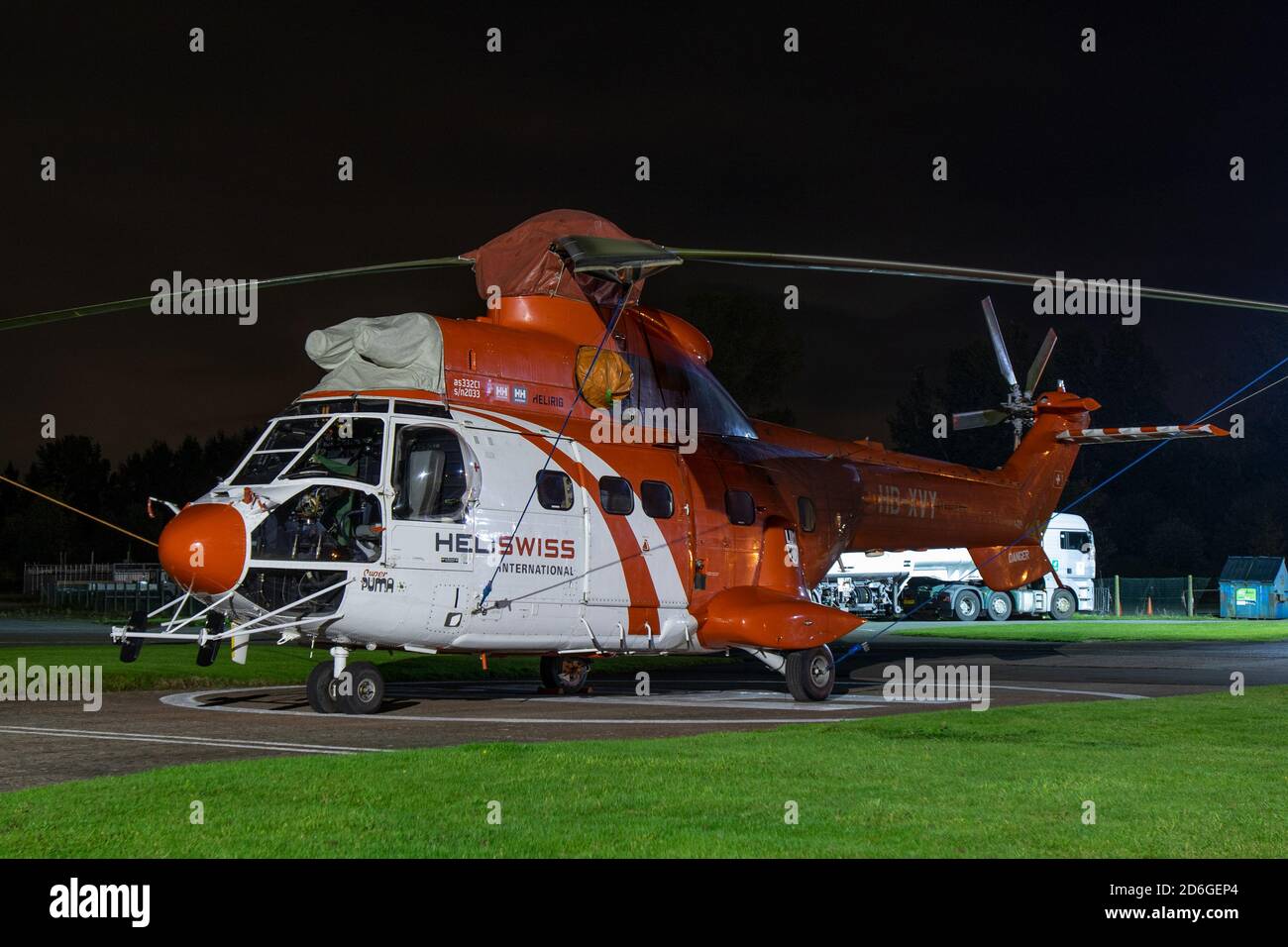 Super Puma Helicopter conducted load lifts from between high rise ...