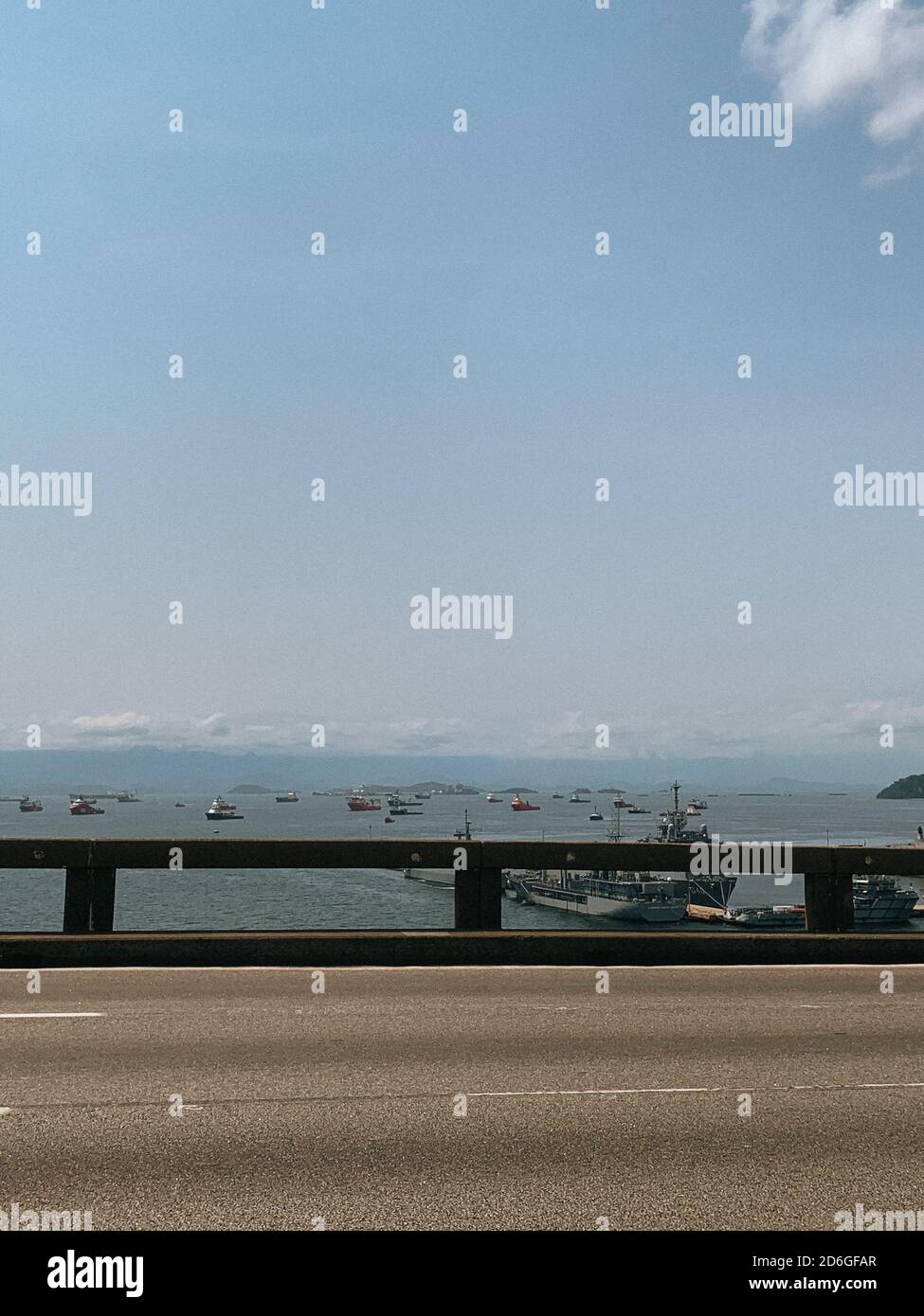 Vertical shot of the bridge in Rio de Janeiro with the horizon and the ...