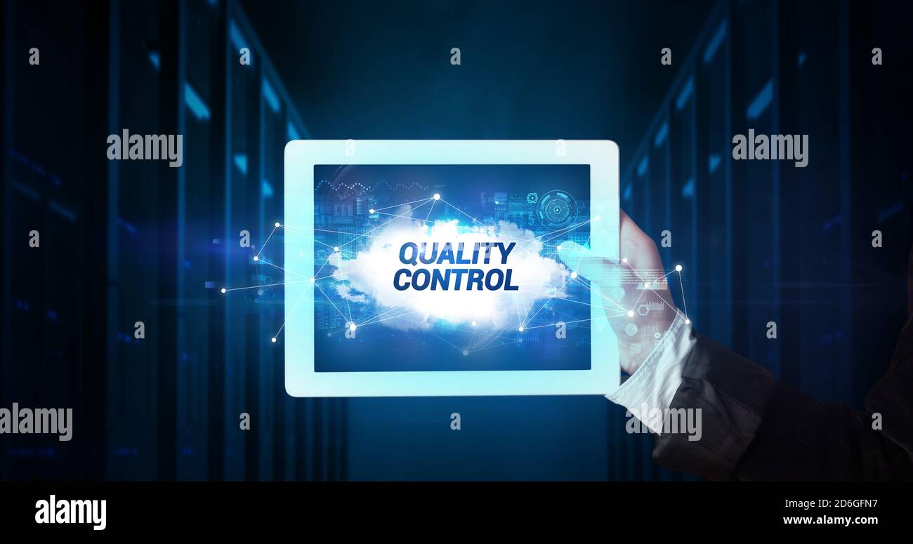 Young business person working on tablet and shows the inscription ...