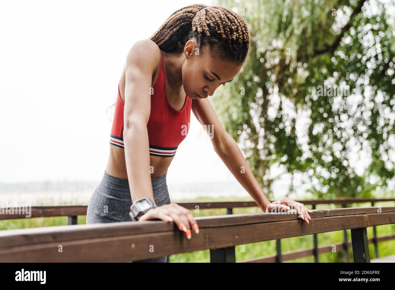Tired african woman run hi-res stock photography and images - Alamy