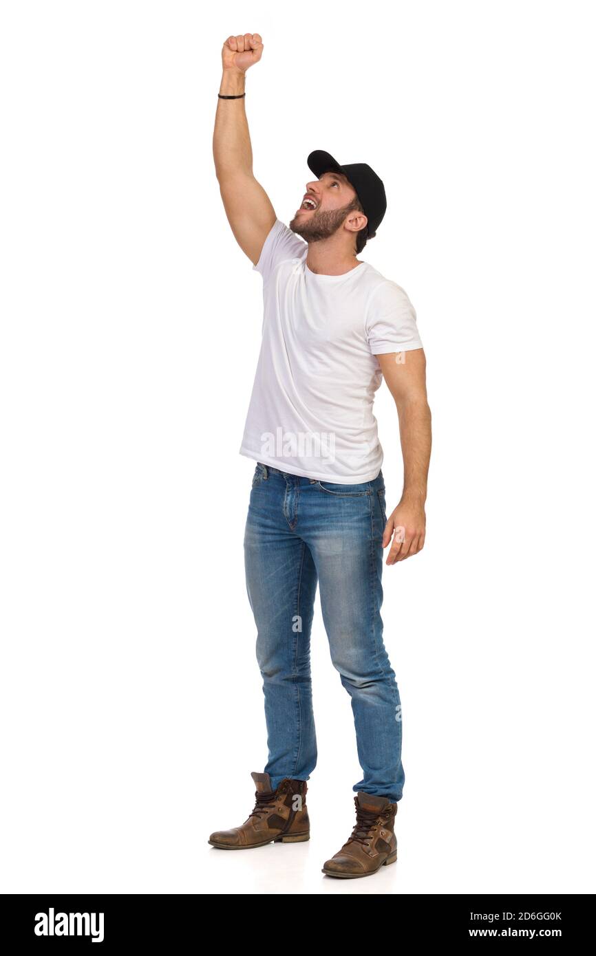 Standing fist arm up mouth open success hi-res stock photography and ...