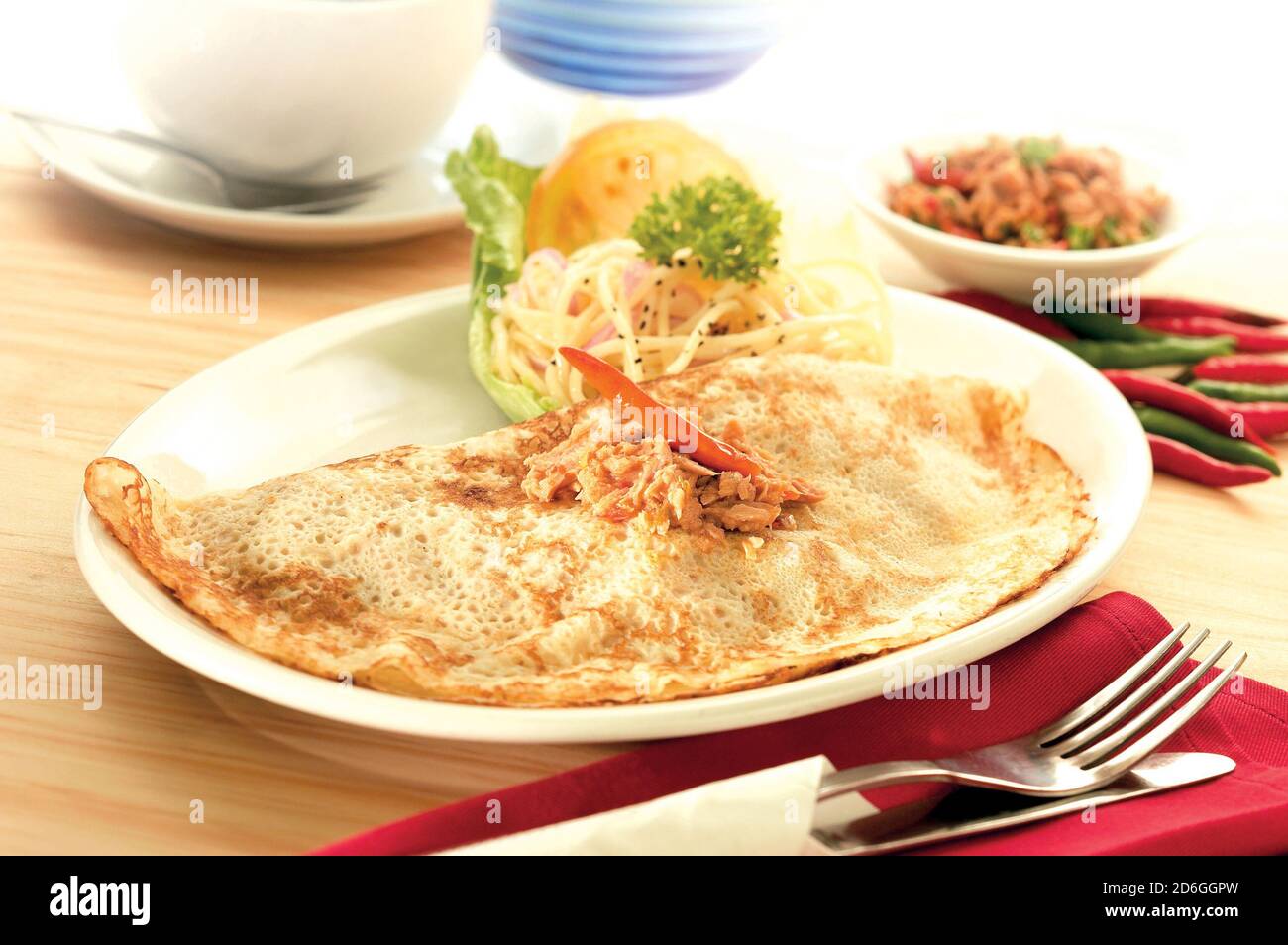 Crepe with pasta and spicy tuna Stock Photo - Alamy