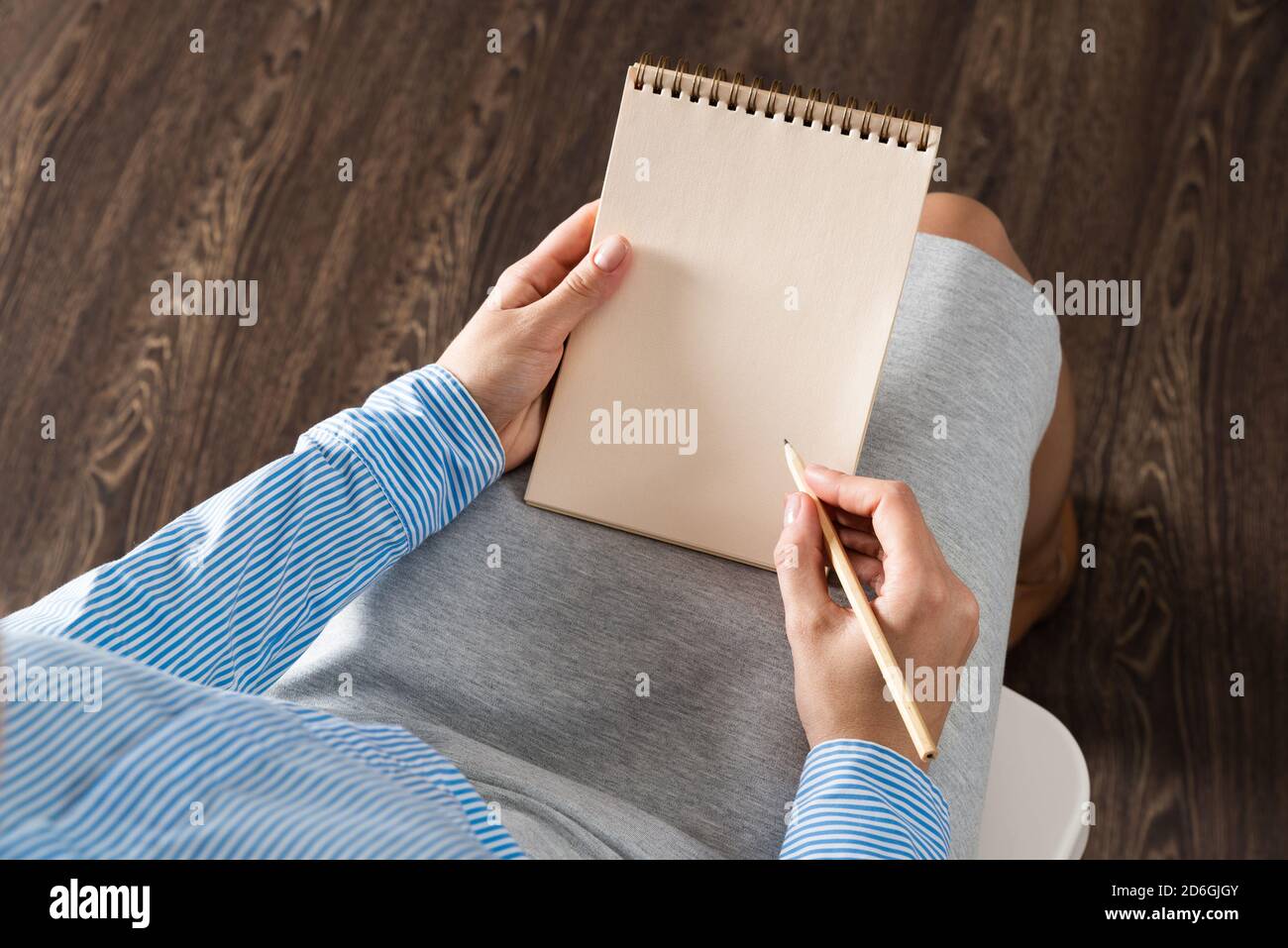 Business woman with notebook Stock Photo - Alamy