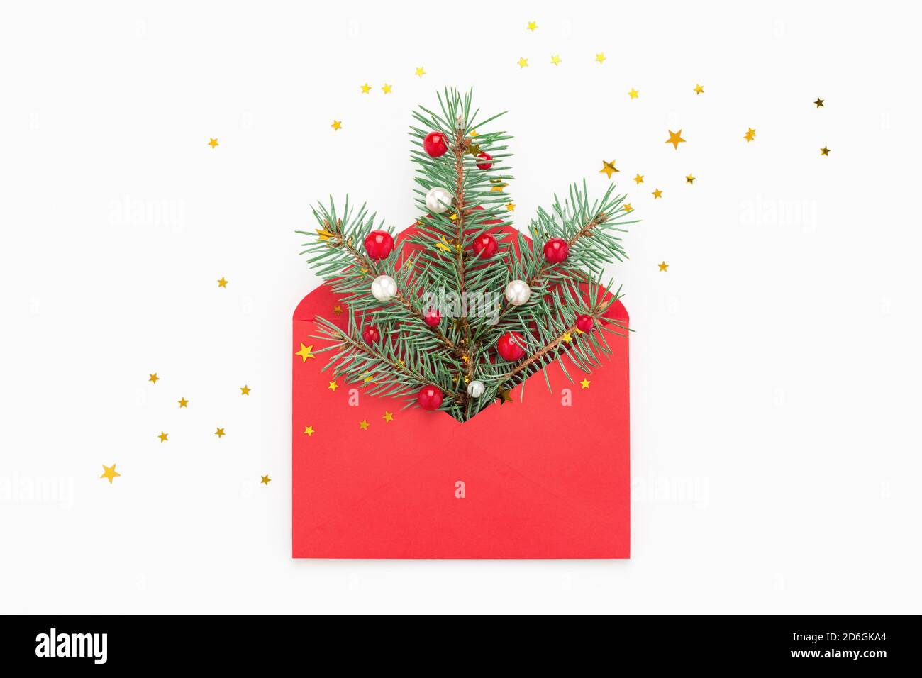 Christmas tree symbol in red envelope on white background Stock Photo ...