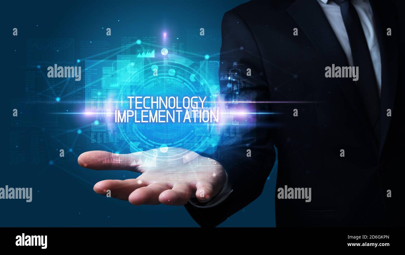 Man hand holding TECHNOLOGY IMPLEMENTATION inscription, technology ...