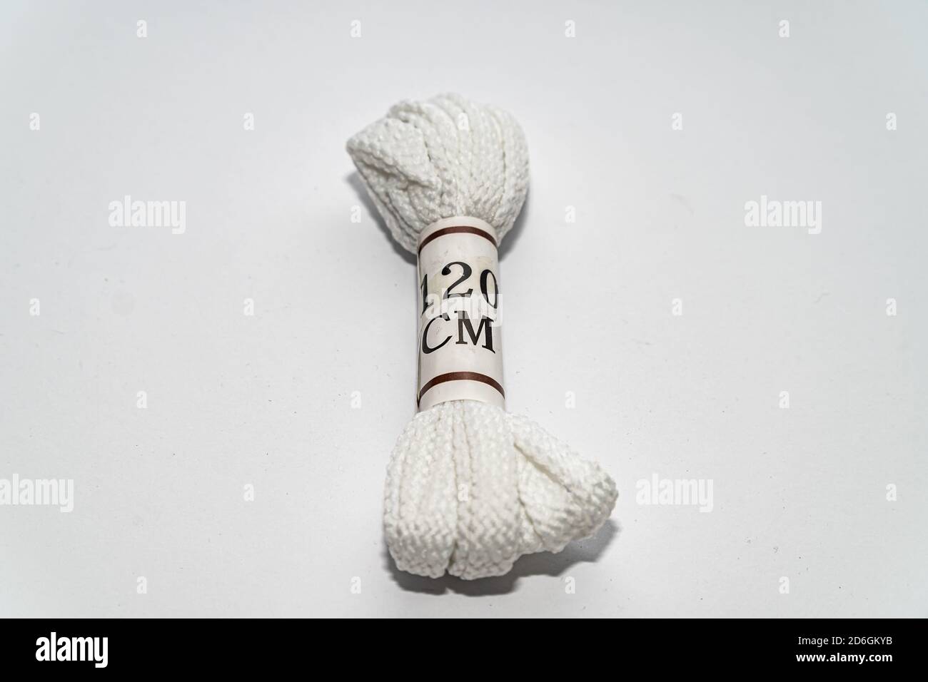 White cord rope isolated on a white background Stock Photo - Alamy