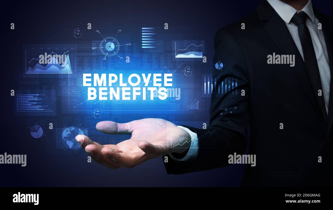 Hand of Businessman holding EMPLOYEE BENEFITS inscription, business ...