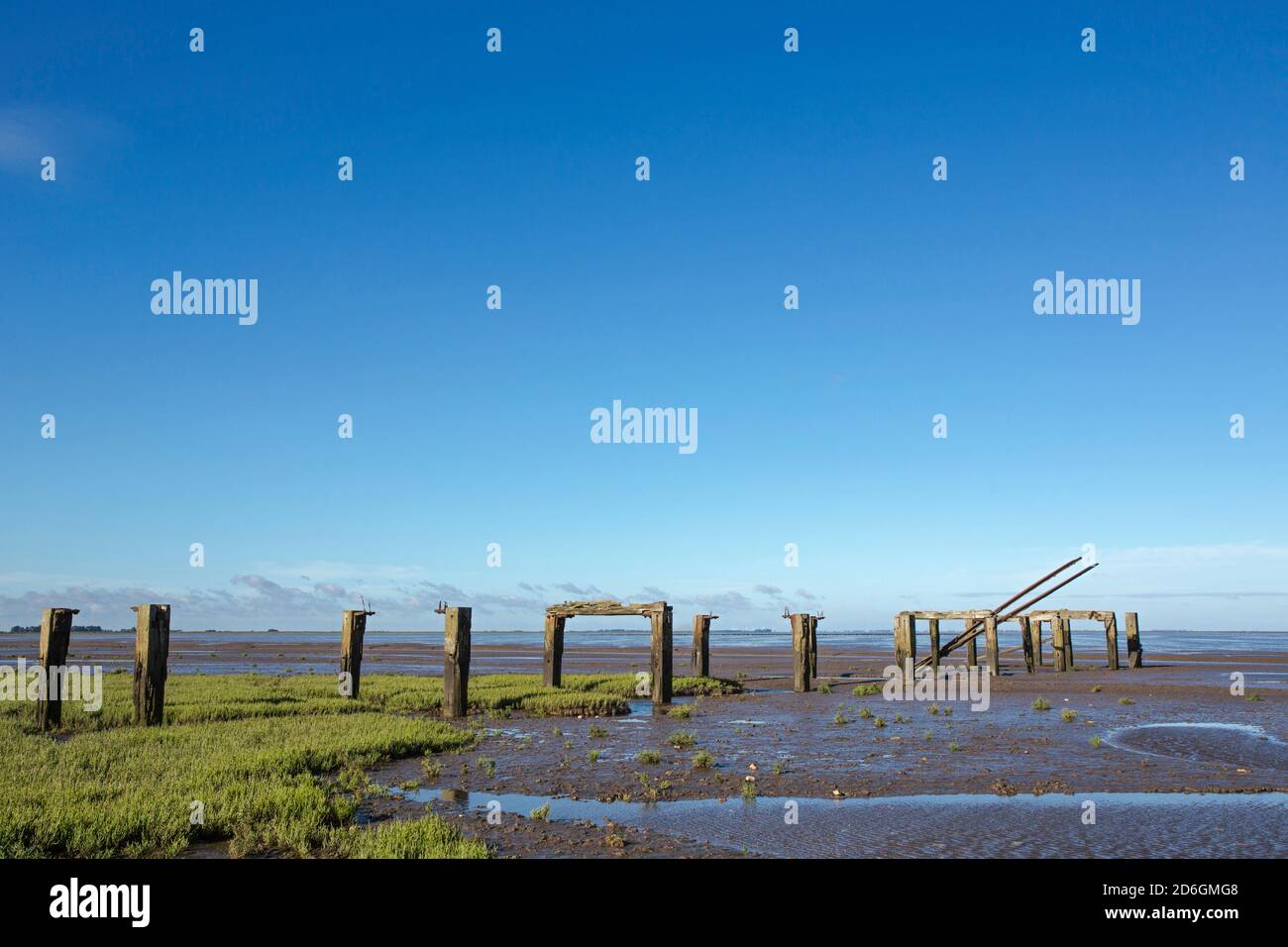 Remains of old gravel jetty in the Wash estuary, Snettisham, Norfolk ...