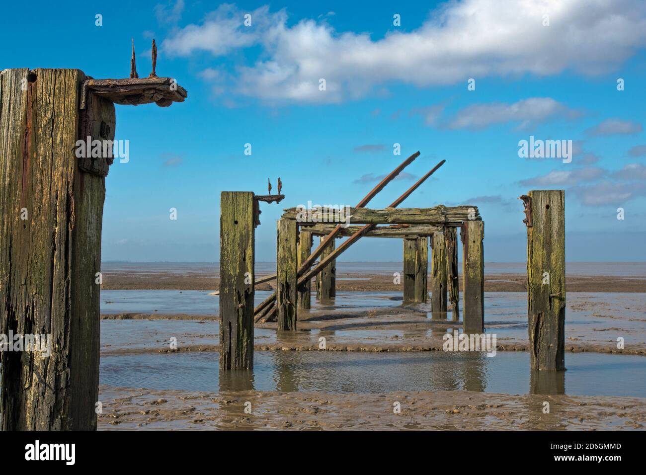 Remains of old gravel jetty in the Wash estuary, Snettisham, Norfolk ...