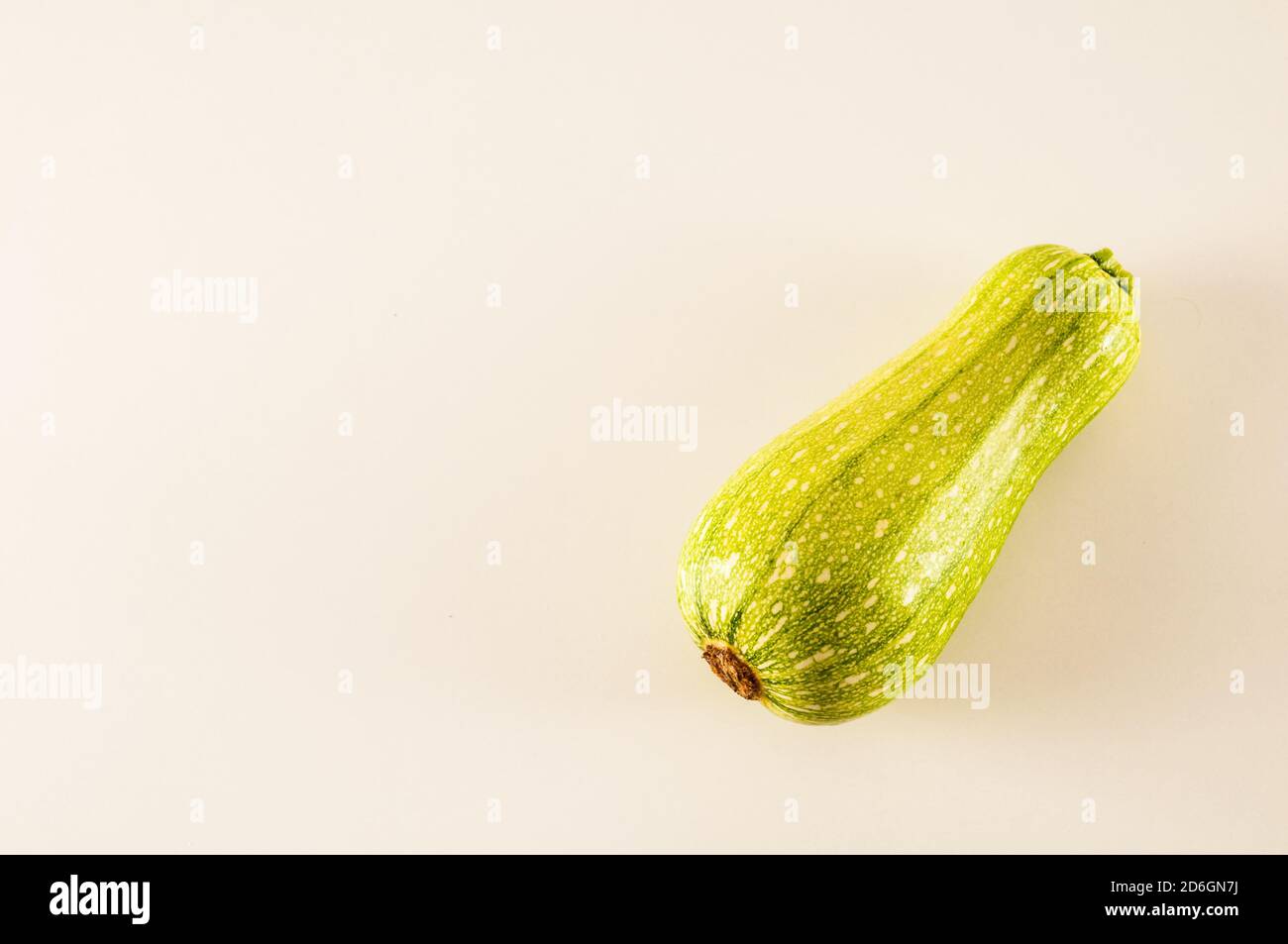 Fresh zucchini isolated on white Stock Photo - Alamy
