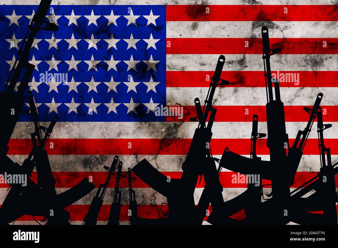 Several automatic rifles raised up on the background of the American ...