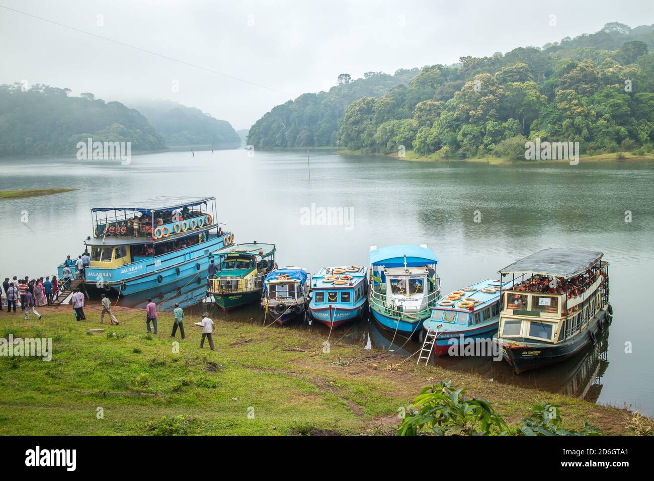 Thekkady boating in forest lake. boat safari in river Munnar Idukki ...